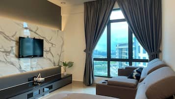 Apartamento Standard | Sala de estar | Smart TV de 40 polegadas com canais digitais