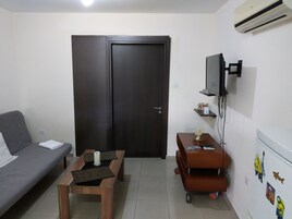 Apartamento | 2 quartos, ferros/tábuas de passar roupa, Wi-Fi de cortesia