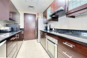 Apartamento superluxo | Cozinha privada | Geladeira, micro-ondas, fogão, cooktop