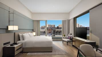 Suite, 1 quarto (Outdoor Living Area) | 1 quarto, edredões de penas, minibar, cofre no quarto