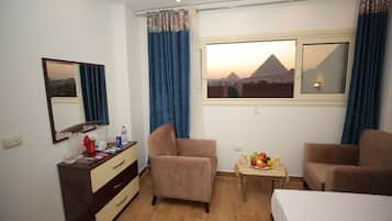 1 quarto, camas de colchão pillowtop, minibar