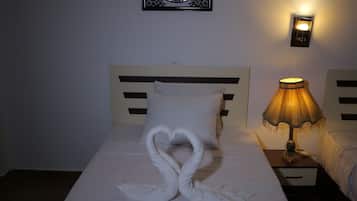 1 quarto, camas de colchão pillowtop, minibar