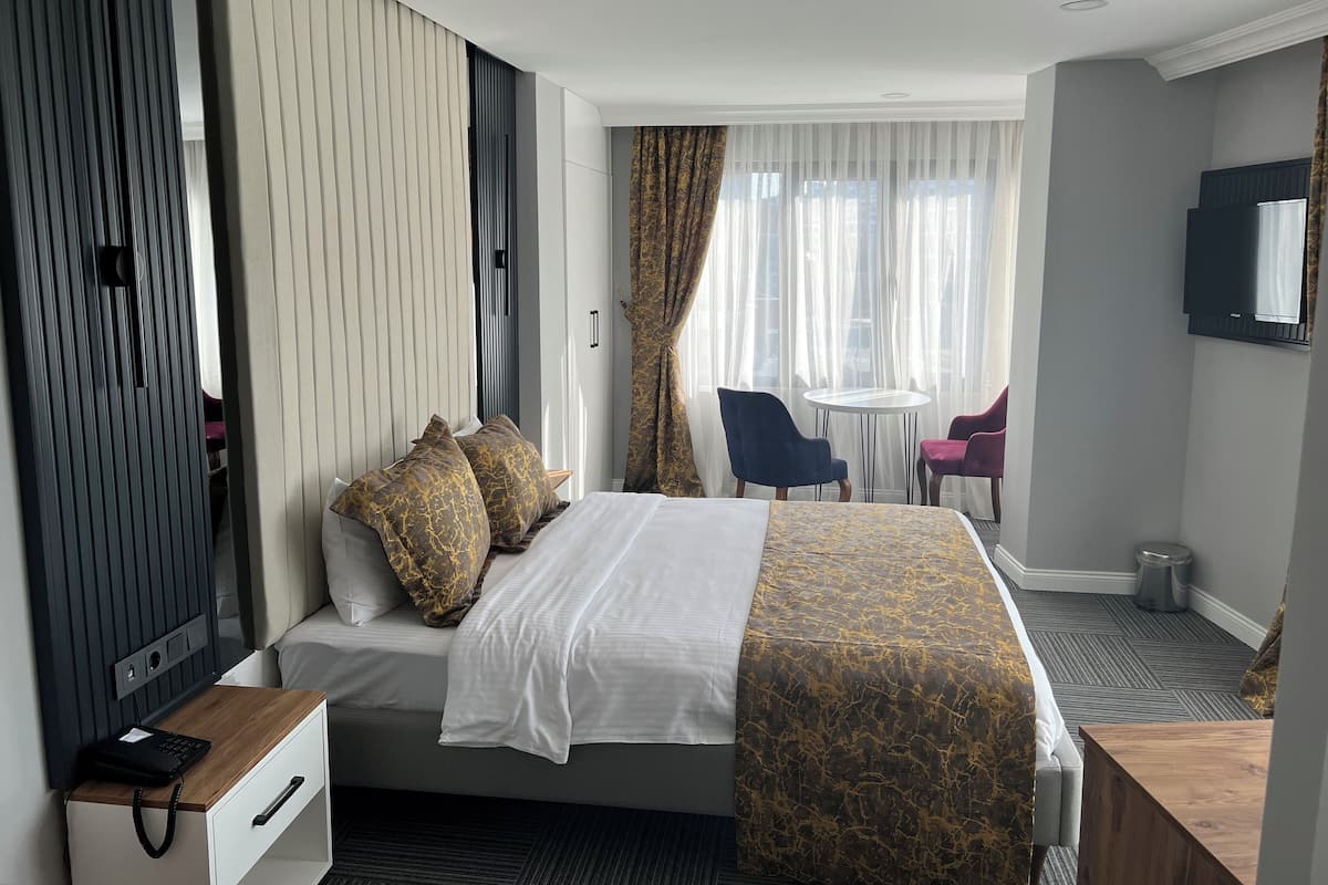 Minibar, secretária, quartos insonorizados, ferro/tábua de engomar