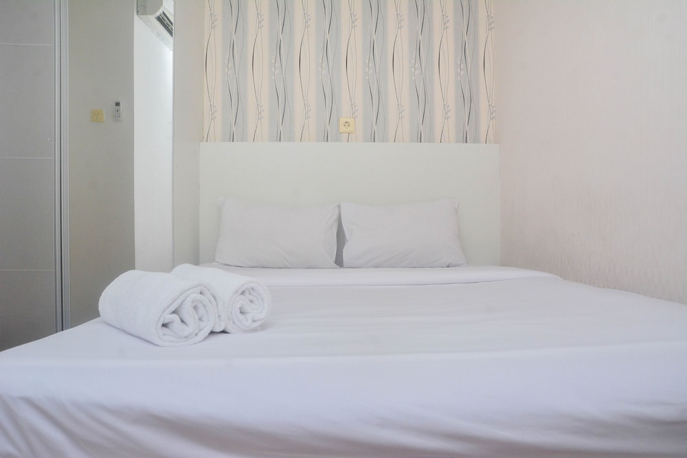 Minimalist And Warm 2br At Bassura City Apartment - 