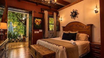 Suite Superior, vista para o jardim | Edredões de penas, camas de colchão pillowtop, minibar, secretária