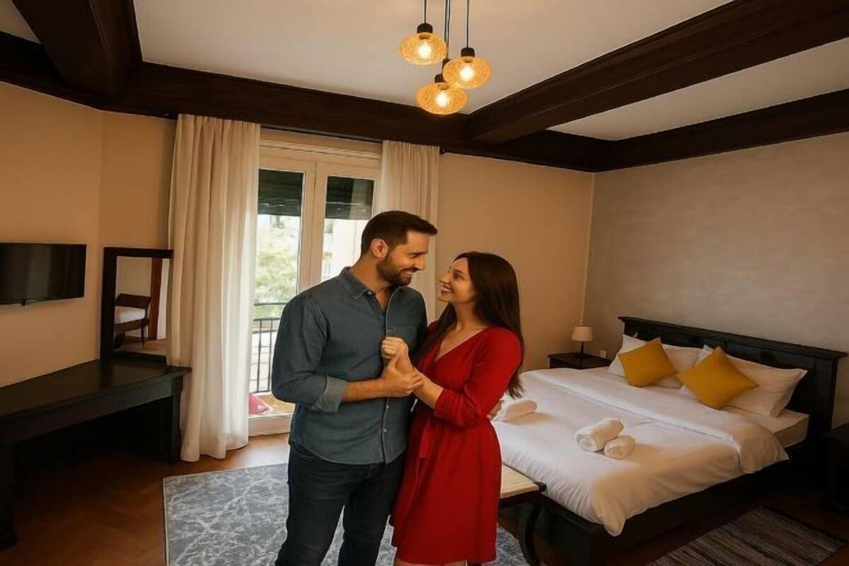 Edredões de penas, camas de colchão viscoelástico, minibar, secretária