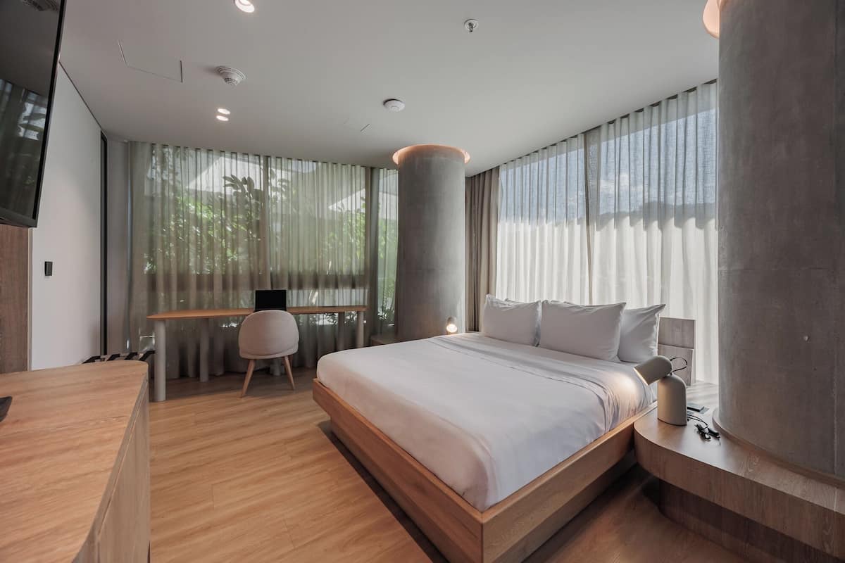 Apartamento grand, terraço | Frigobar, cofres nos quartos, cortinas blackout, quartos à prova de som