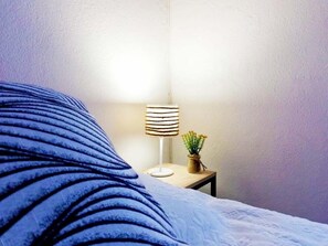 Apartamento família, 2 quartos | Berços grátis, berço de viagem, Wi-Fi de cortesia, roupa de cama