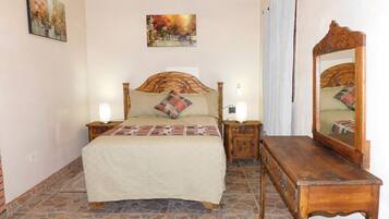 Apartamento Básico, 1 quarto, cozinha | Edredões de penas, com decoração personalizada