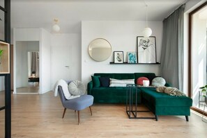 Apartamento Premium | Sala de estar | Televisor 