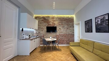 Apartamento empresarial | Cozinha privada | Frigobar, cooktop, lava-louças, máquina de café expresso