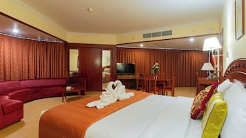 Suite Signature | 1 quarto, camas de colchão pillowtop, minibar, cofre no quarto