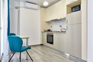 Estúdio Familiar | 1 quarto, com decoração personalizada, com mobília individualizada 