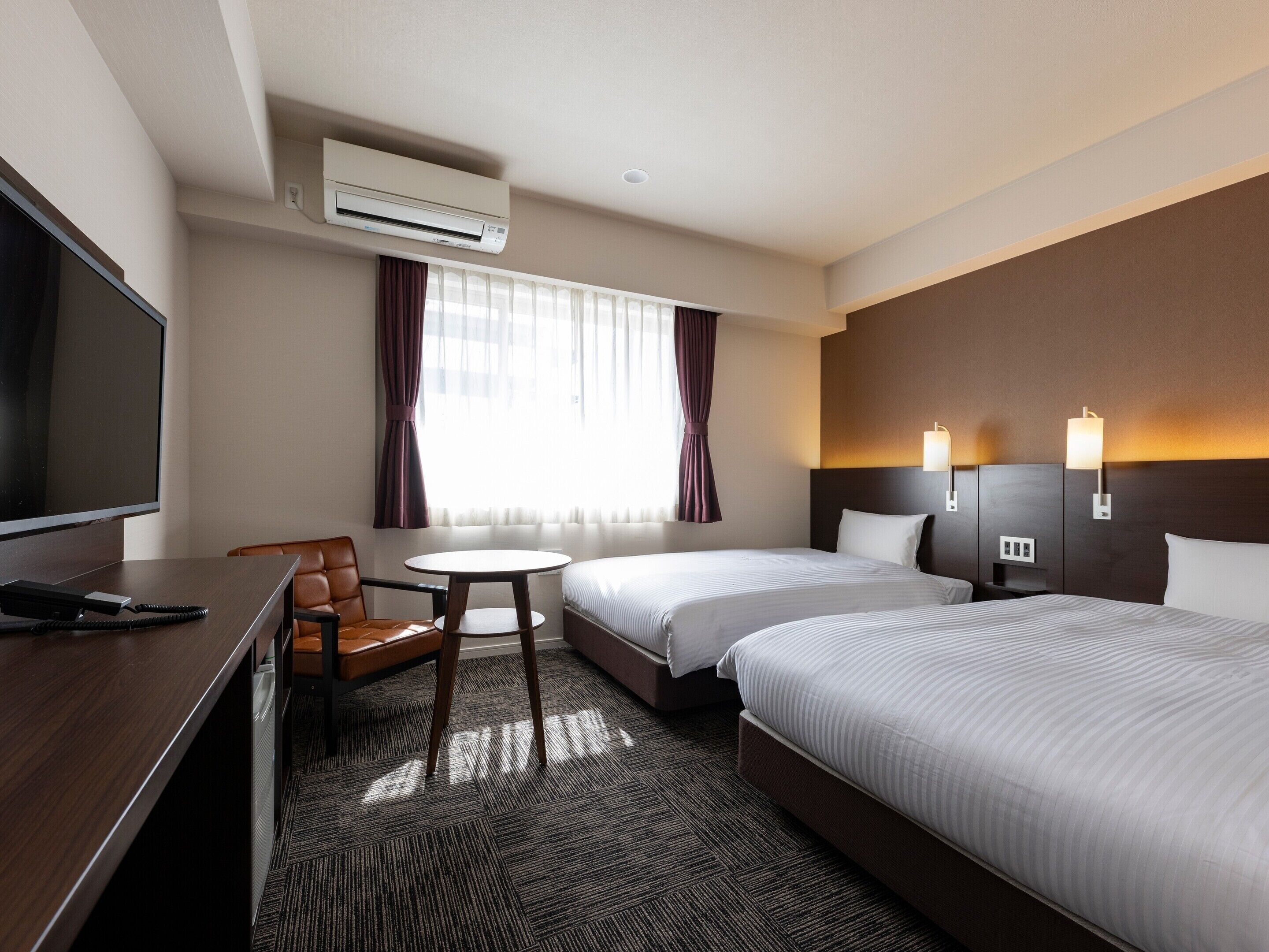 Quarto Twin Deluxe | Cofre no quarto, cortinas/cortinados opacos, Wi-fi grátis 