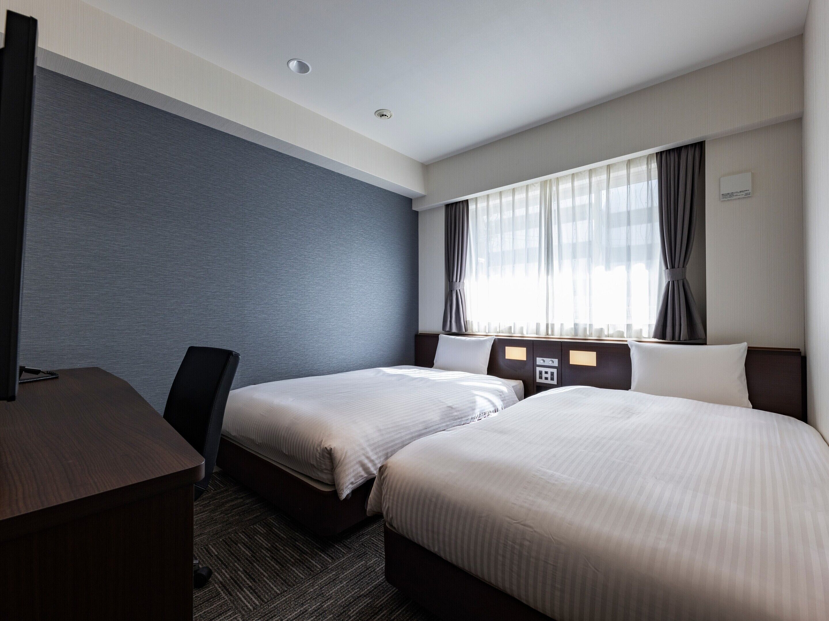 Quarto Twin Standard, não fumadores | Cofre no quarto, cortinas/cortinados opacos, Wi-fi grátis 