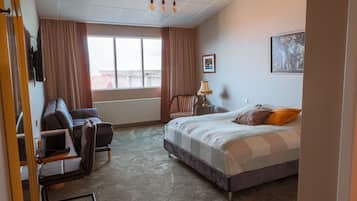 Quarto standard | Escrivaninha, berço de viagem, Wi-Fi de cortesia, roupa de cama