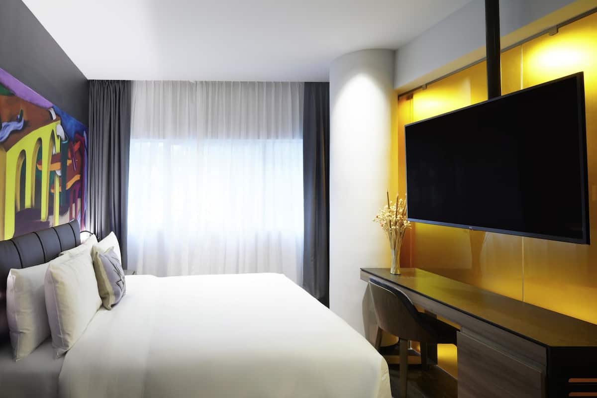 Suíte, 1 cama King, no canto (Corner) | 1 quarto, roupas de cama premium, edredons de pluma, frigobar