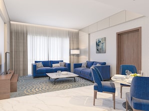 Executive Suite - Sea View | Área de estar | TV LED 50 polegadas com canais via satélite, TV