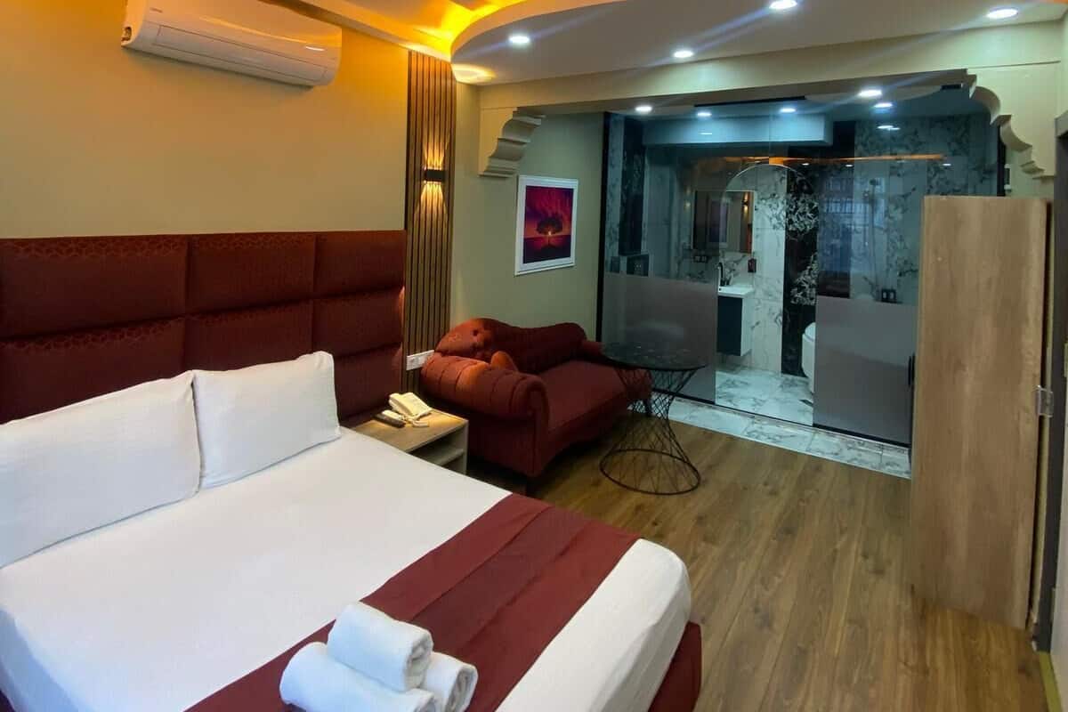 Quarto Deluxe | Roupa de alta qualidade, edredões de penas, minibar grátis