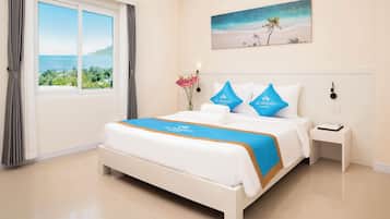 Quarto Duplo Premier, vista para o oceano | Minibar grátis, secretária, cortinas/cortinados opacos