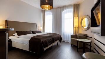 Quarto triplo | 1 quarto, cofres nos quartos, Wi-Fi de cortesia, roupa de cama