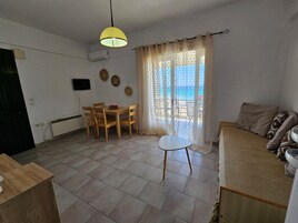 Apartamento, 1 quarto, para fumantes, sacada | Área de estar