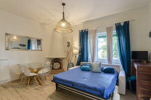 Apartamento, 1 cama de casal e sofá-cama, terraço | Área de estar