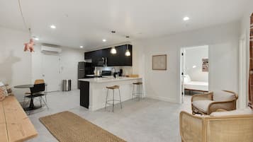 Apartamento Deluxe | Sala de estar