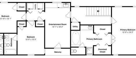 Planta baixa mostrando um quarto, duas casas de banho, uma sala de entretenimento, área de serviços e um closet espaçoso.