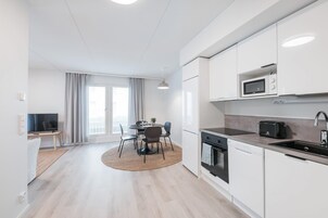 Apartamento clássico | Cozinha privada | Geladeira, micro-ondas, cooktop, lava-louças