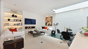 Apartamento, várias camas | Sala de estar