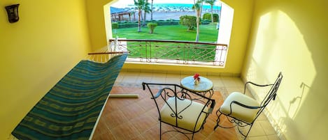 Quarto real, vista para a praia | Terraço/pátio