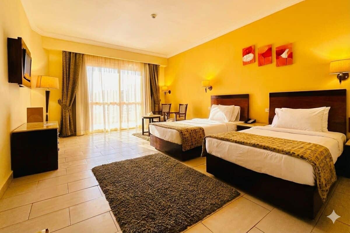 Quarto Familiar, 2 quartos, varanda | Roupa hipoalergénica, edredões de penas, minibar, cofre no quarto