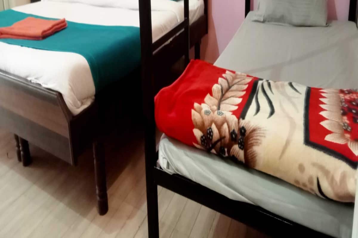 Quarto Quádruplo Deluxe | Roupa de cama fornecida