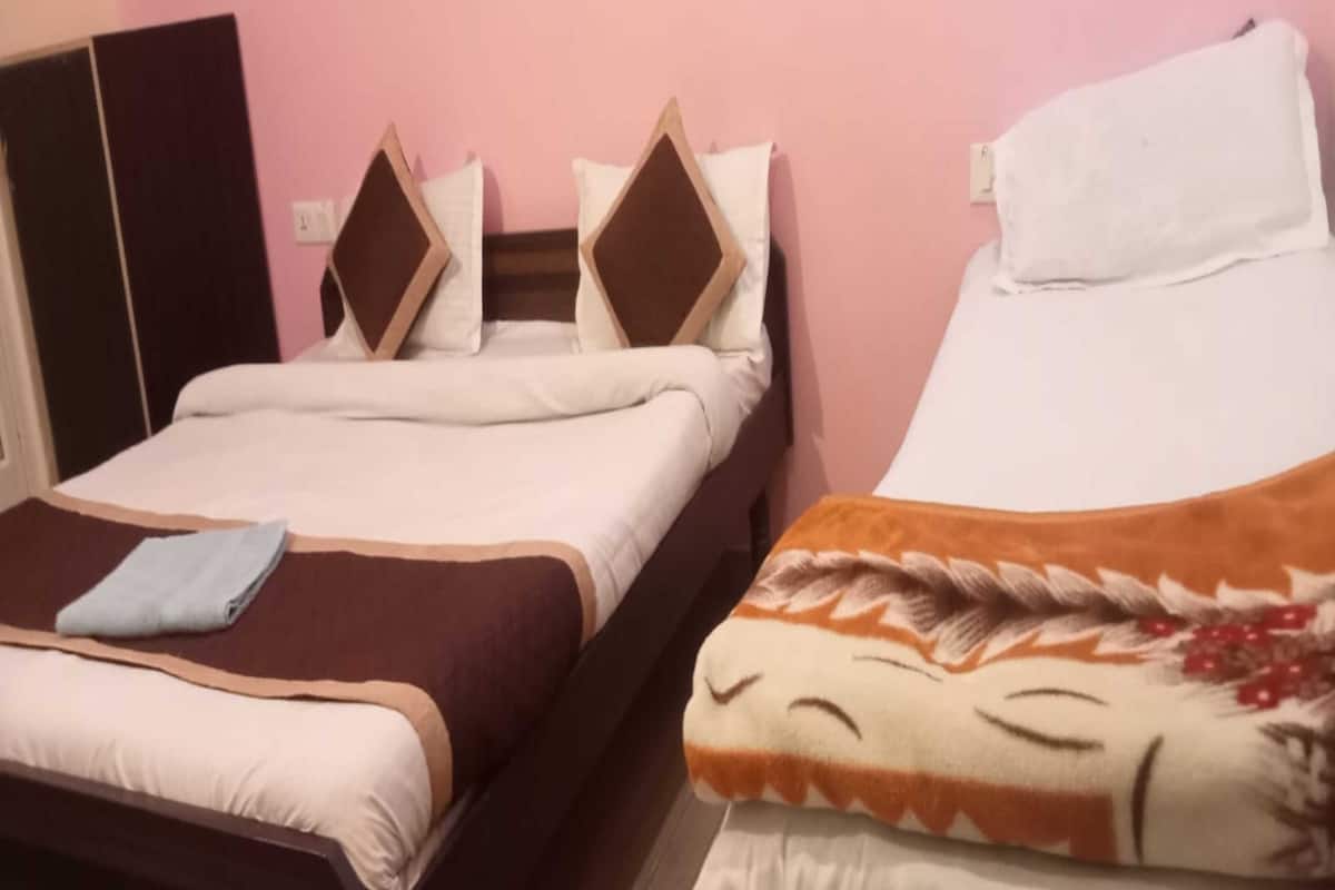Quarto Triplo Deluxe | Roupa de cama fornecida