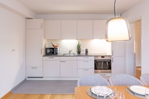 Apartamento Cidade, 1 quarto | Cozinha privada | Um frigorífico, uma cafeteira/bule, uma chaleira elétrica