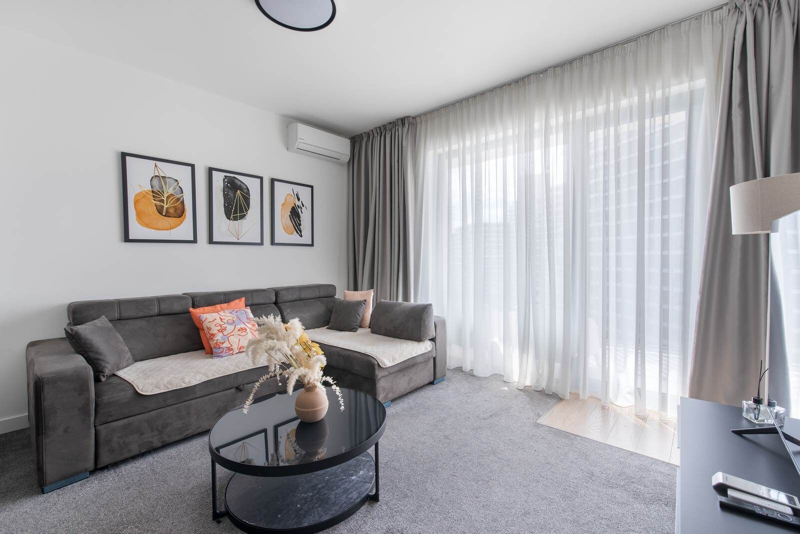 Apartamento superior, 1 quarto, vista para o rio | Área de estar