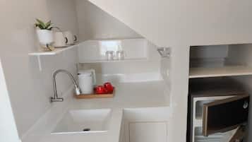 Quarto Deluxe (King) | Casa de banho | Um polibã, artigos de higiene pessoal grátis