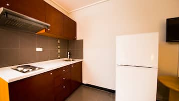 Apartamento standard | Cozinha privada | Geladeira, cafeteira/chaleira, chaleira elétrica