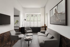 Suite | Cofre no quarto, ferro/tábua de engomar 