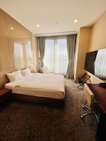 Suíte júnior | Roupas de cama premium, frigobar, cofres nos quartos, escrivaninha