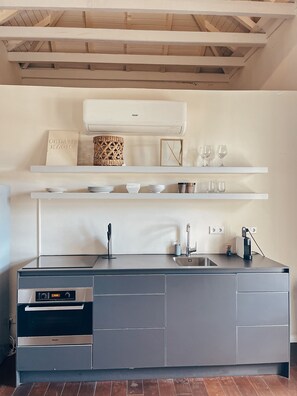 Apartamento conforto, 1 quarto, vista para a cidade | Roupas de cama premium, frigobar, cofres nos quartos