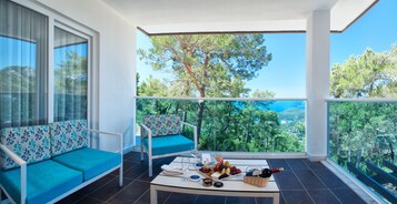 Quarto standard, vista parcial para o mar | Terraço/pátio