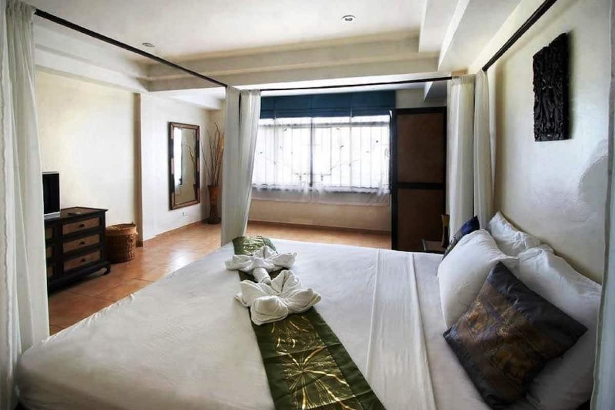 Apartamento, 1 quarto | Cofres nos quartos, cortinas blackout, berços grátis