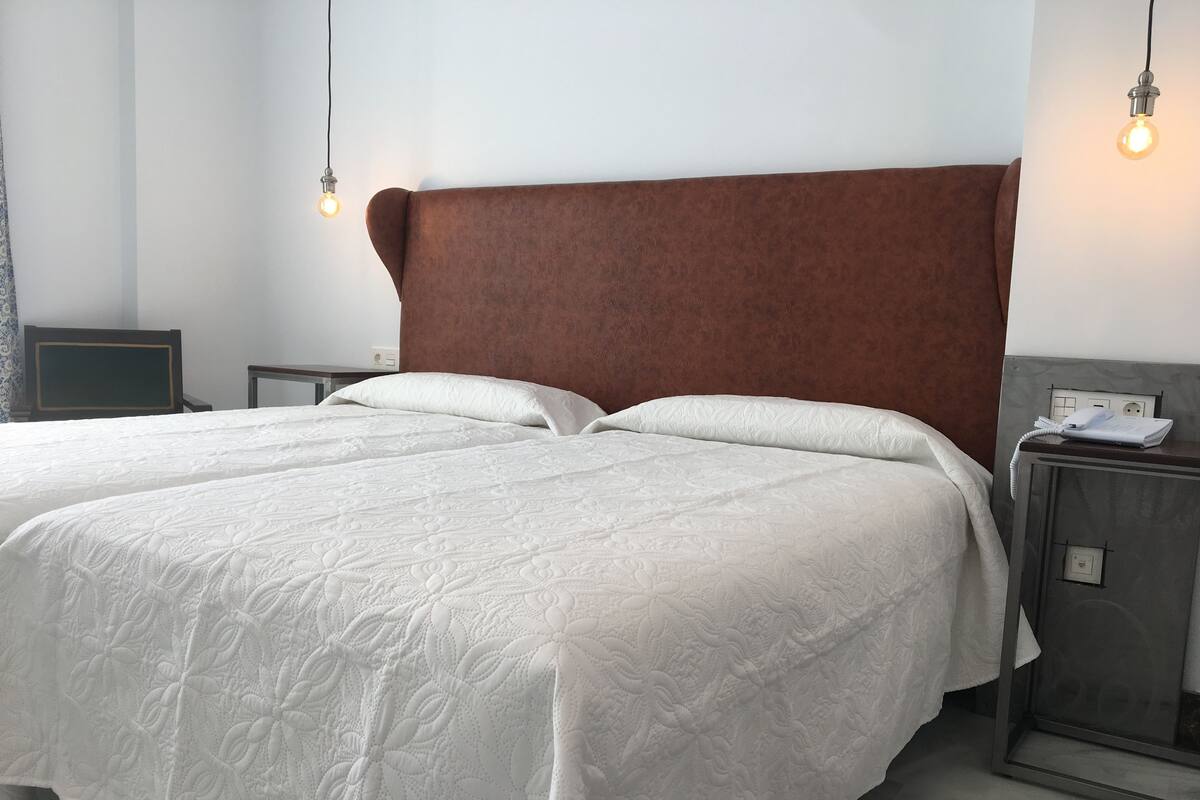 Wi-Fi de cortesia, roupa de cama