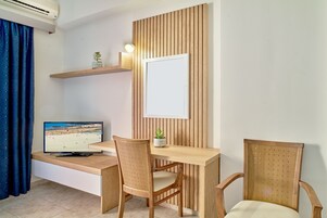 Apartamento família | Roupas de cama premium, cortinas blackout, Wi-Fi de cortesia