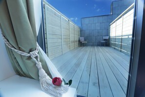 Quarto, 1 cama King, sacada | Terraço/pátio