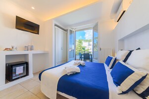 Quarto casal superior | Frigobar, cofres nos quartos, berços (sobretaxa)