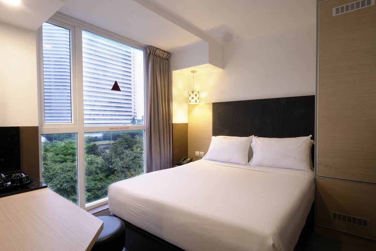 Quarto casal executivo | Escrivaninha, Wi-Fi de cortesia, roupa de cama