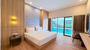 Quarto Duplo ou Twin Deluxe | Minibar grátis, cofre no quarto, secretária